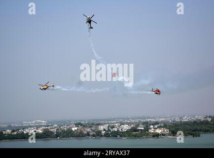 The Indian Air Force's Sarang aerobatic team showcase its manoeuvres at ...