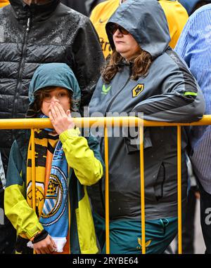A young fan waits for players to arrive before the Sky Bet Championship ...
