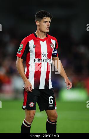 Christian Norgaard of Arsenal FC looks dejected as he walks past the ...