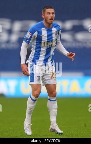 Ben Wiles #23 of Huddersfield Town arrives ahead of the Sky Bet ...