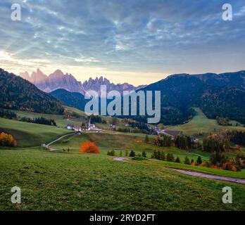 Autumn daybreak Santa Magdalena famous Italy Dolomites village view in ...