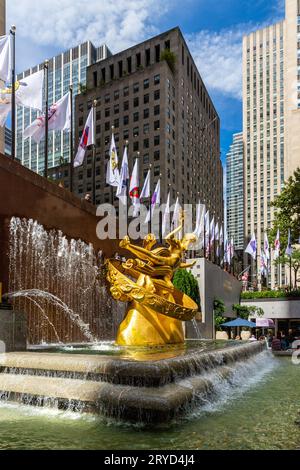 The Prometheus golden statue in Rockefeller Center - New York City, USA ...
