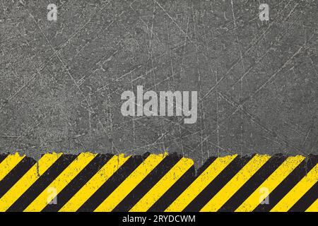 Yellow background with black grunge hazard sign Stock Photo - Alamy