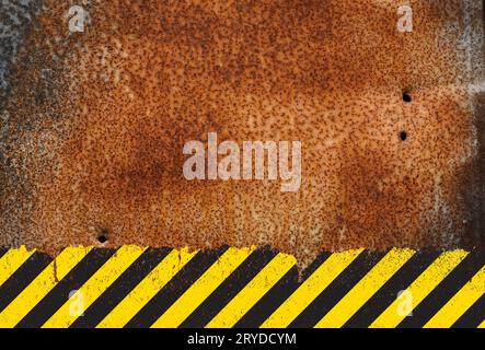 Rusty metal background with grunge hazard sign Stock Photo - Alamy