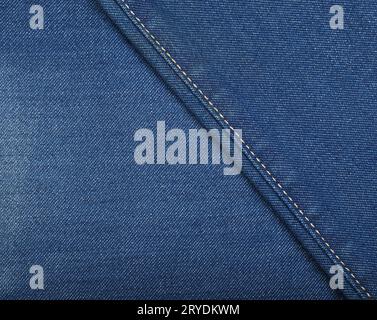 Blue washed faded jeans texture with seams, clasps, buttons and rivets ...