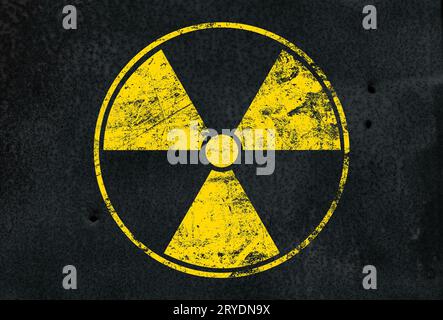 Yellow radioactive sign over black background Stock Photo - Alamy