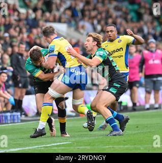 Northampton Saints' James Ramm is tackled by Leinster's Andrew Porter ...