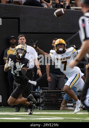 Vanderbilt wide receiver Will Sheppard (14) is stopped by Hawaii ...