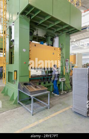 Large machine press form Stock Photo - Alamy