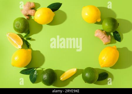 Frame made of ingredients for preparing lemonade on pink background ...