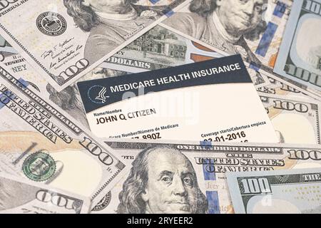 Fake Medicare card with fake US currency and pen Stock Photo - Alamy