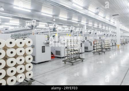 Production of threads in a textile factory Stock Photo - Alamy