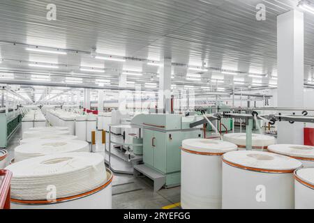 Production of threads in a textile factory Stock Photo - Alamy