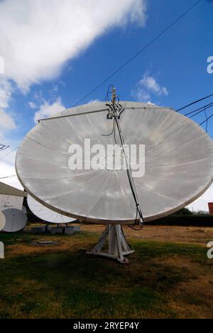 a parabolic antenna or satellite dish for receiving radio waves ...