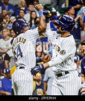 Milwaukee Brewers' Blake Perkins, right, celebrates his two-run home ...