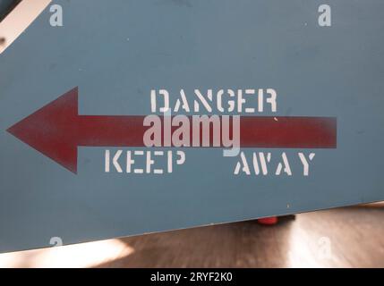 direction arrow points in one way, sign to move towards this direction ...