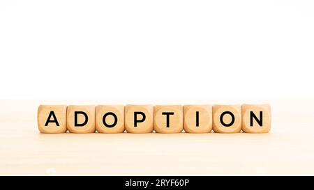Adoption word on wooden blocks. Copy space. White background Stock ...
