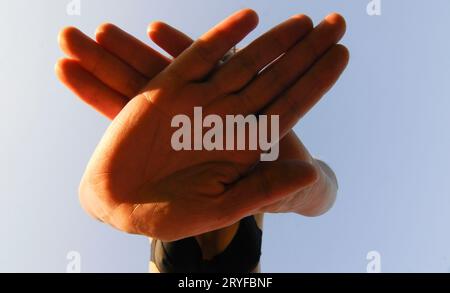 a defense position signaling no and unwanted behavior stop or no go ...