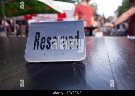 Reservation sign in a pub or restaurant Stock Photo - Alamy
