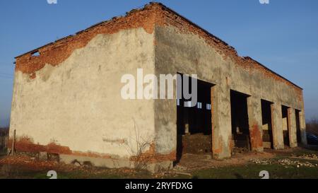 decay and structural damage in building, abandoned house in rural area ...