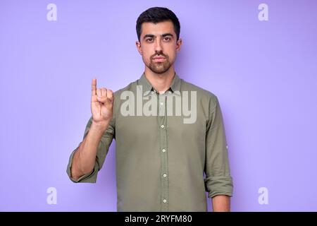 serious handsome man showing letter W w with fingers .the Alphabet in ...