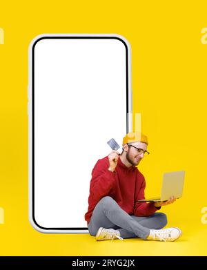 Guy or hipster shopper in red hat with gift boxes Stock Photo - Alamy