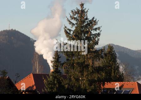 air pollution from house fire, smoke cloud in a village Stock Photo - Alamy