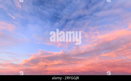 Wild, fiery evening sky with clouds just before sunset Stock Photo - Alamy
