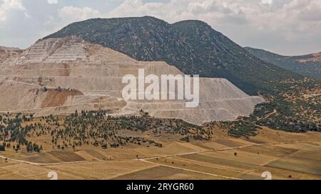 Mountains destroyed by marble quarries. Burdur Yarışlı Lake in Turkey ...