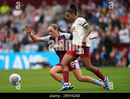 Aston Villa's Lucy Parker (left) and Paula Tomas warm up before the ...
