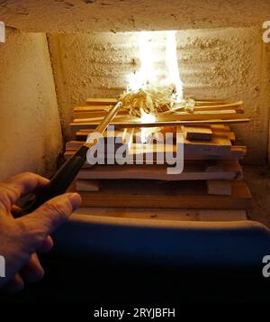 Wood-burning stove, example of properly lighting a fireplace Stock ...