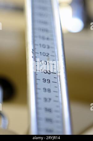 graduated rod to measure patients' height during medical examination at ...