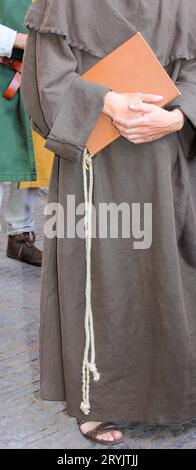 Franciscan friar with the brown dress called habit and the rope around ...