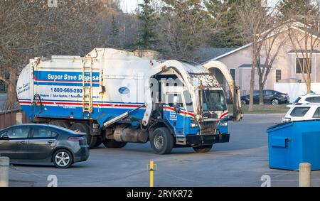 Garbage collection for heavy waste. Truck are waiting for the citizens ...