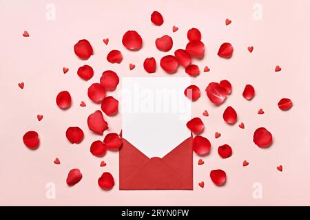 red paper hearts and rose petals on pink background Stock Photo - Alamy