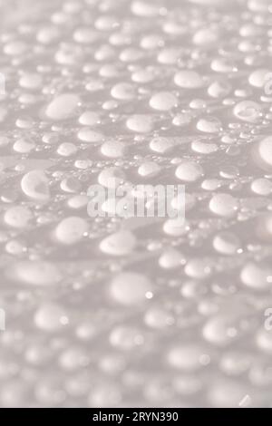 Lots of drops on a white background Stock Photo - Alamy
