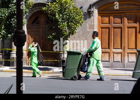 Mexico City, CDMX, Mexico, Garbage collectors working in the street of ...