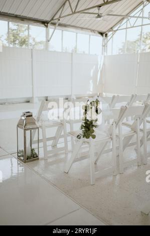 Array of empty white chairs ready for an exhibition Stock Photo - Alamy