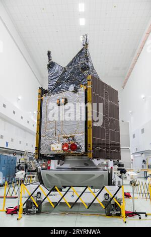 A SpaceX Falcon Heavy rocket with the Psyche spacecraft onboard is ...