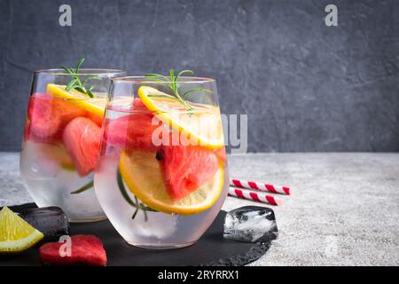 Watermelon lemon lemonade with pieces of watermelon in shape of heart. Refreshing summer drink ...
