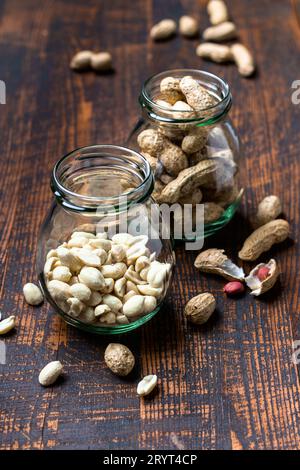 Roasted peeled peanuts in jar Stock Photo - Alamy