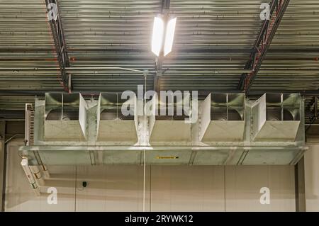 A five-fan industrial refrigeration evaporator fan at an ammonia-cycle ...