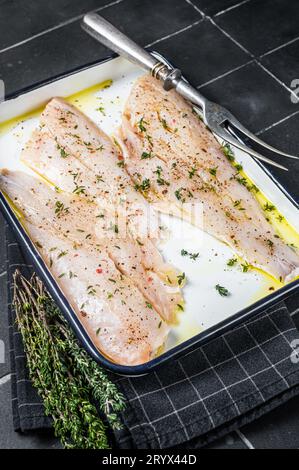 Marinated ocean red perch fillet with olive oil, thyme and spices ...