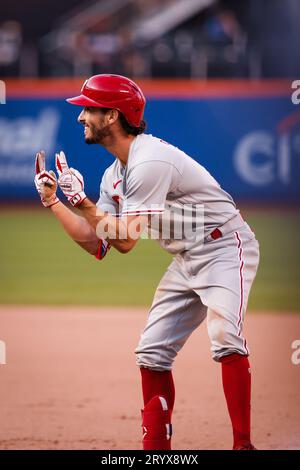 Philadelphia Phillies catcher Garrett Stubbs, center, signs a fan's ...