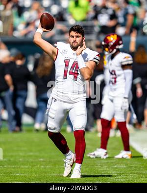 Philadelphia Eagles quarterback Sam Howell warms up before an NFL football game against the ...