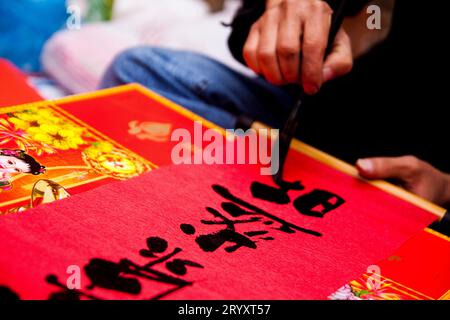 Close to the Temple of Literature, calligraphers show their skills ...