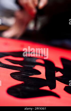 Close to the Temple of Literature, calligraphers show their skills ...