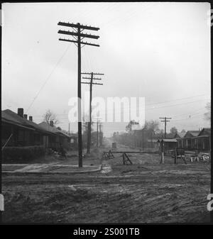 Birmingham, Alabama, USA. circa 1937. Housing- wooden hut, laundry ...