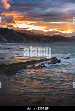 Sunset at Itzurun beach in Zumaia Stock Photo - Alamy