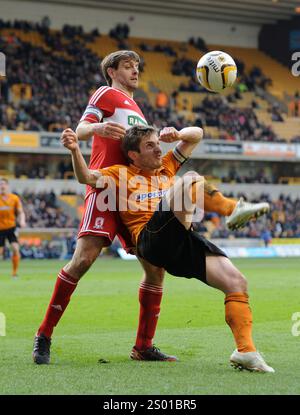 Kevin Doyle of Wolverhampton Wanderers and Jonathan Woodgate of ...